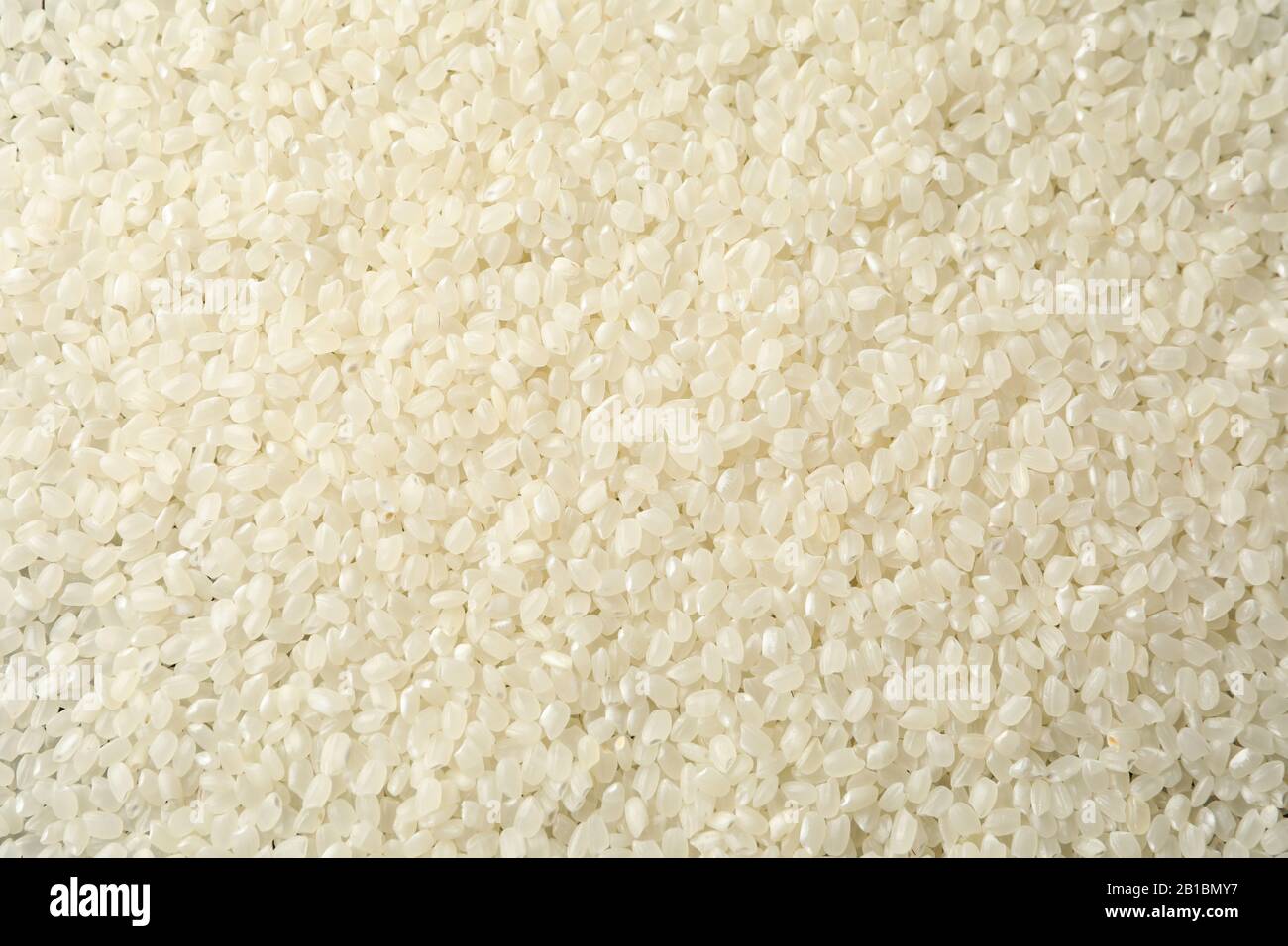 Rice texture background, close up and macro Stock Photo - Alamy