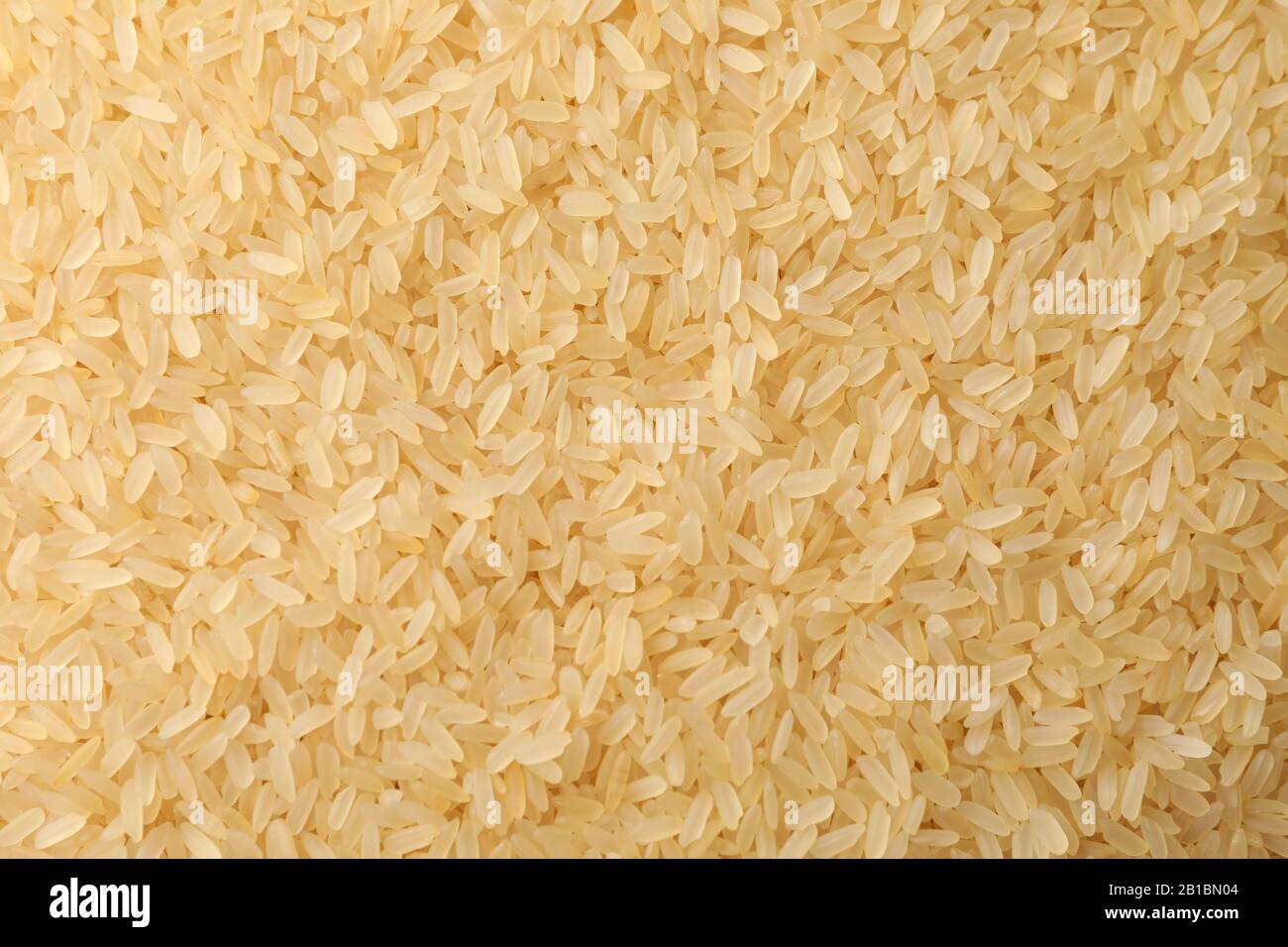 Rice texture background, close up and macro Stock Photo - Alamy