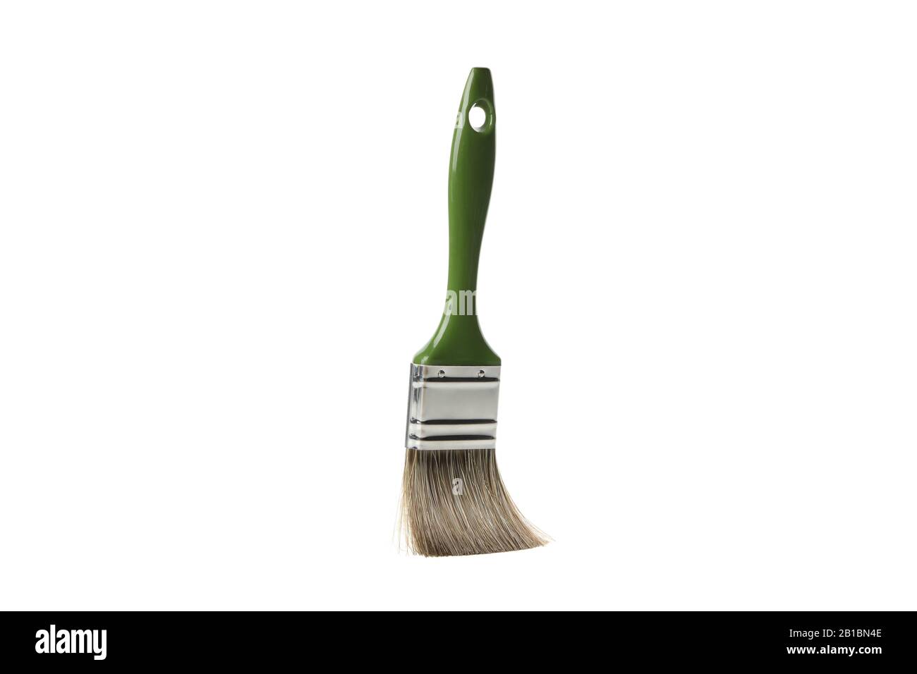 Green paint brush isolated on white background Stock Photo - Alamy