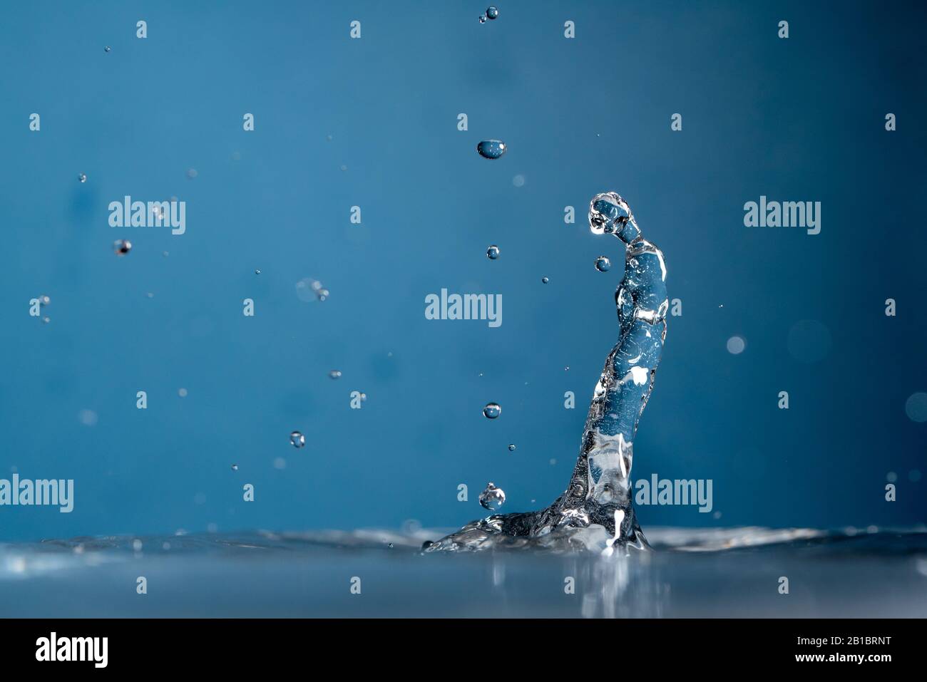 Water Drop falling making droplet splash and waves clean and fresh ...