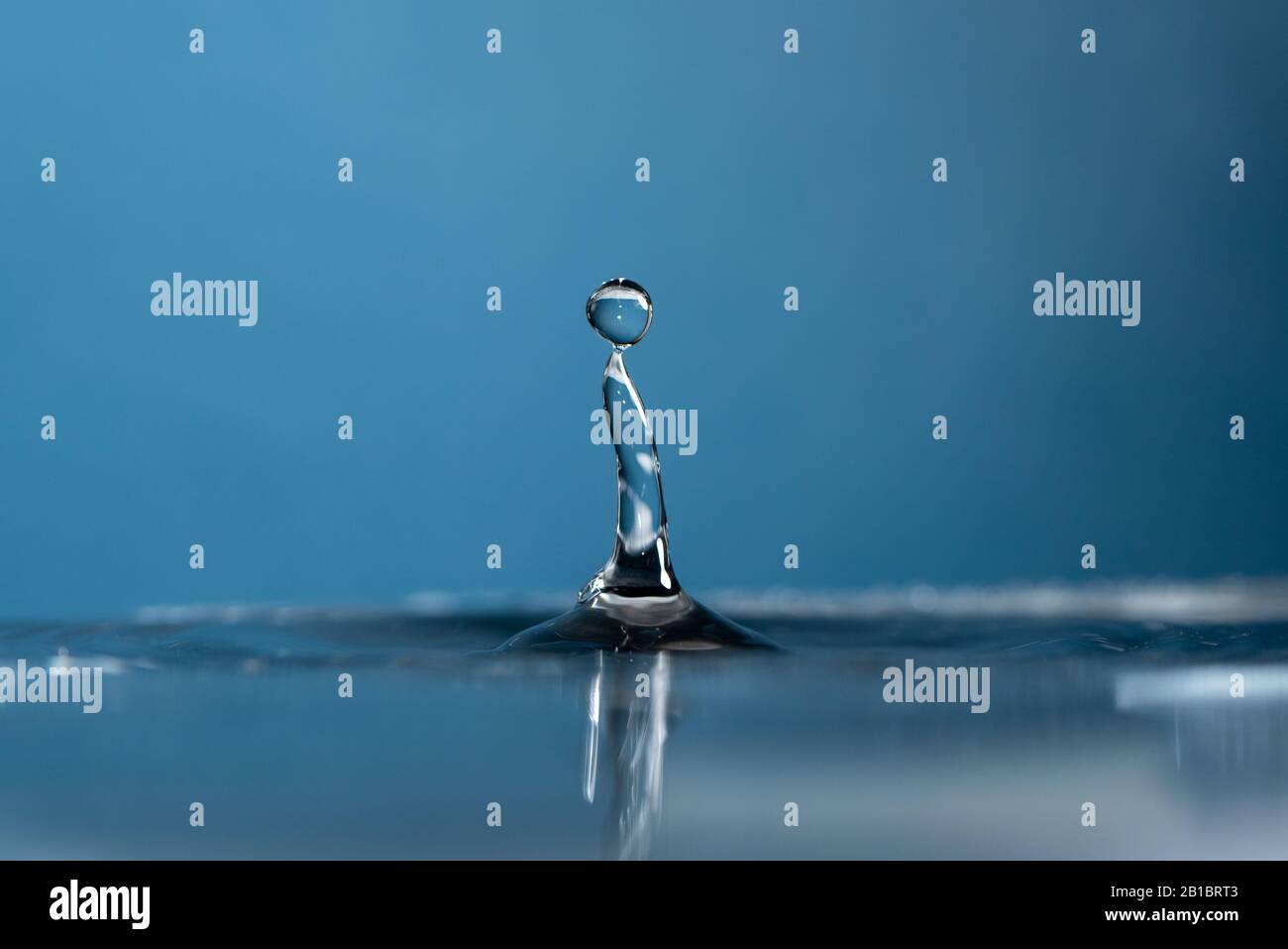 Water Drop falling making droplet splash and waves clean and fresh ...