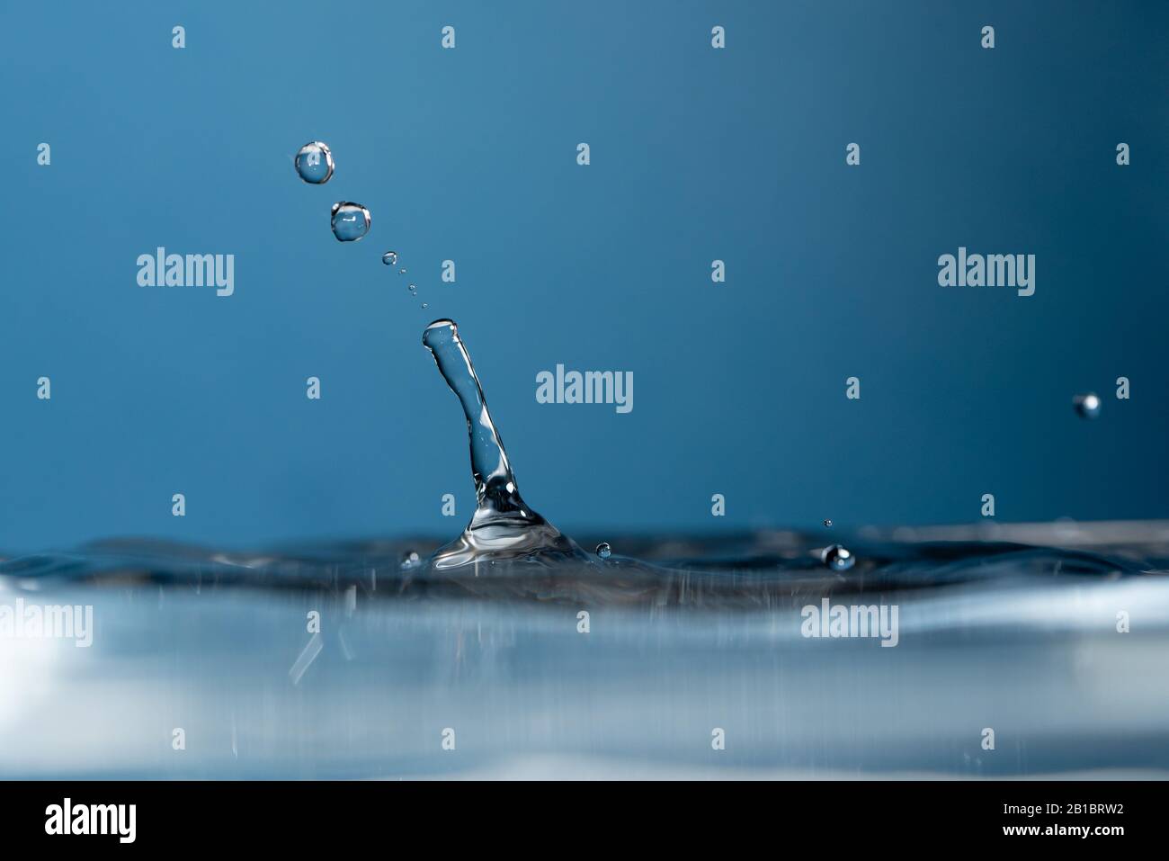 Water Drop falling making droplet splash and waves clean and fresh ...