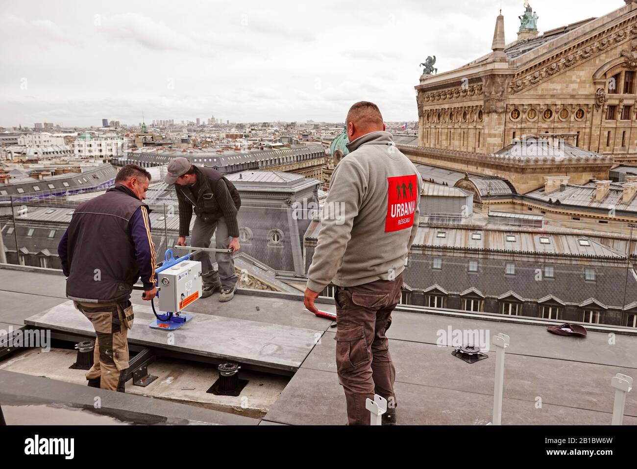 Construction workers on Galeries Lafayette rooftop observation deck ...