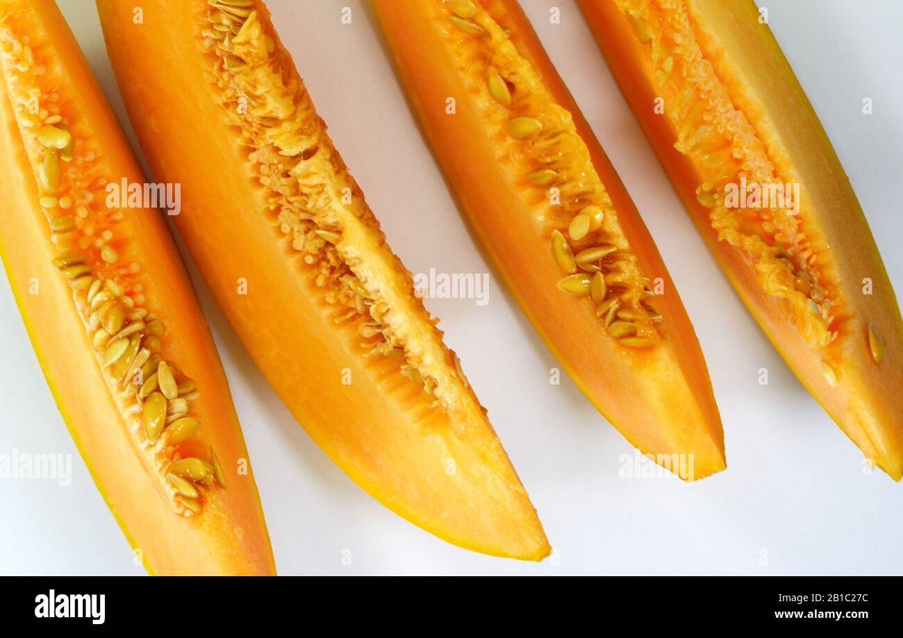 melon slice isolated on white background Stock Photo - Alamy