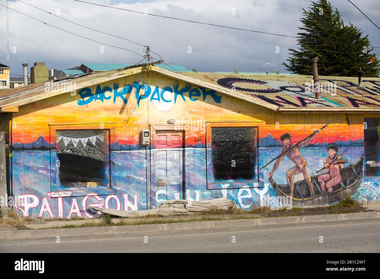 A mural of indigenous people on a backpackers spot in Puerto Natales ...