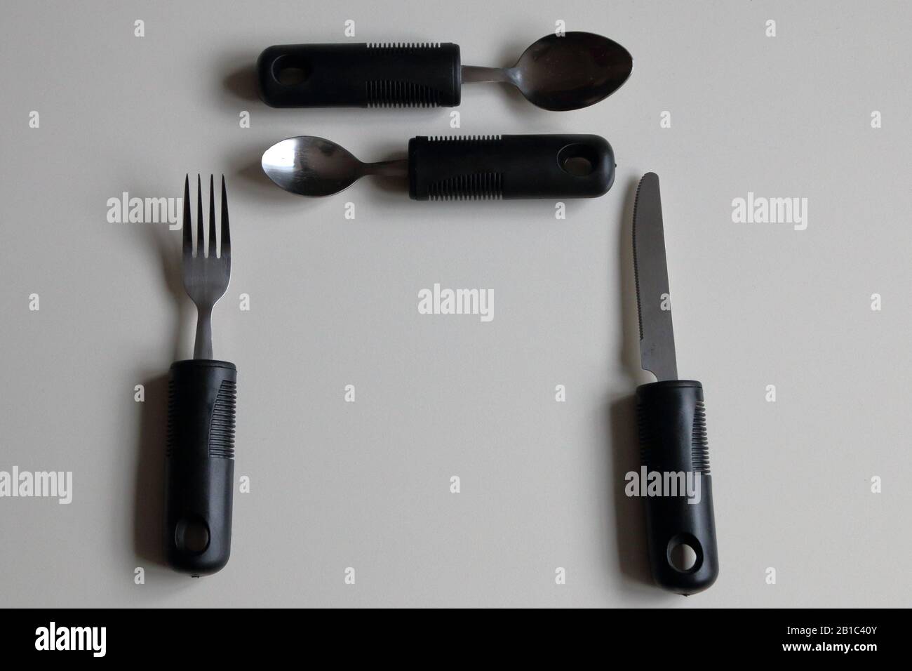 Adapted cutlery disabled people hi-res stock photography and images - Alamy