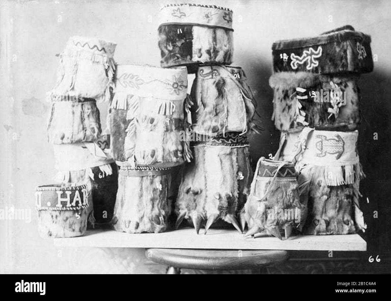 Fur covered boxes with decoration of beadwork and deerhooves might be ...