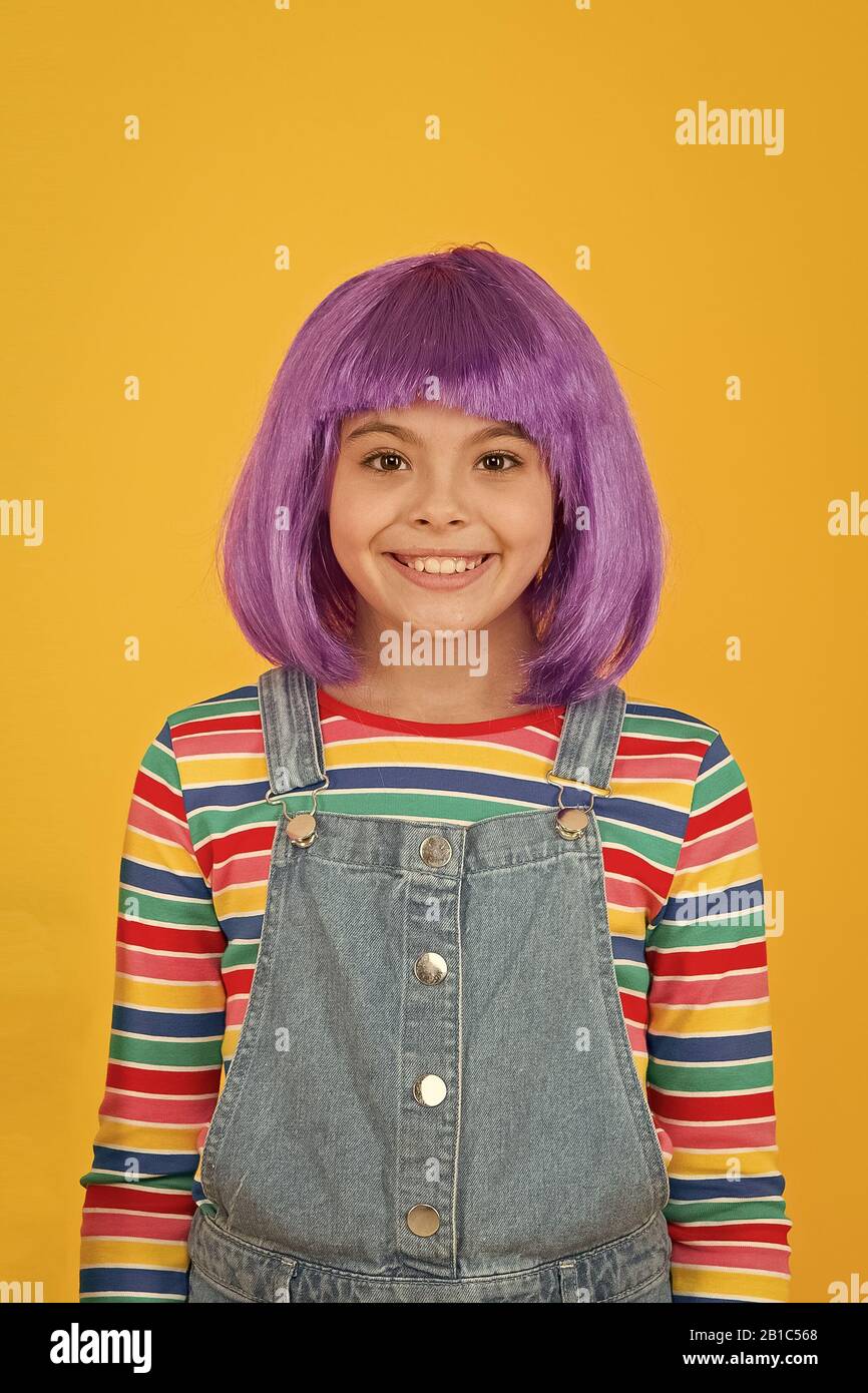 Being fancy child. Small child wear violet hair wig yellow background ...