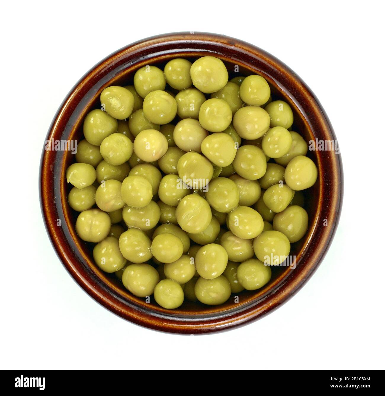 Canned green peas in a ceramic bowl isolated on white background Stock ...
