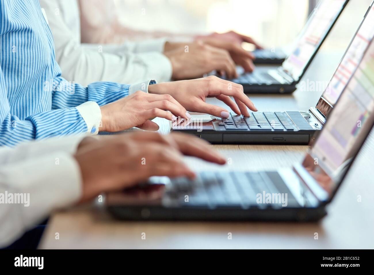 Typing laptops hi-res stock photography and images - Alamy