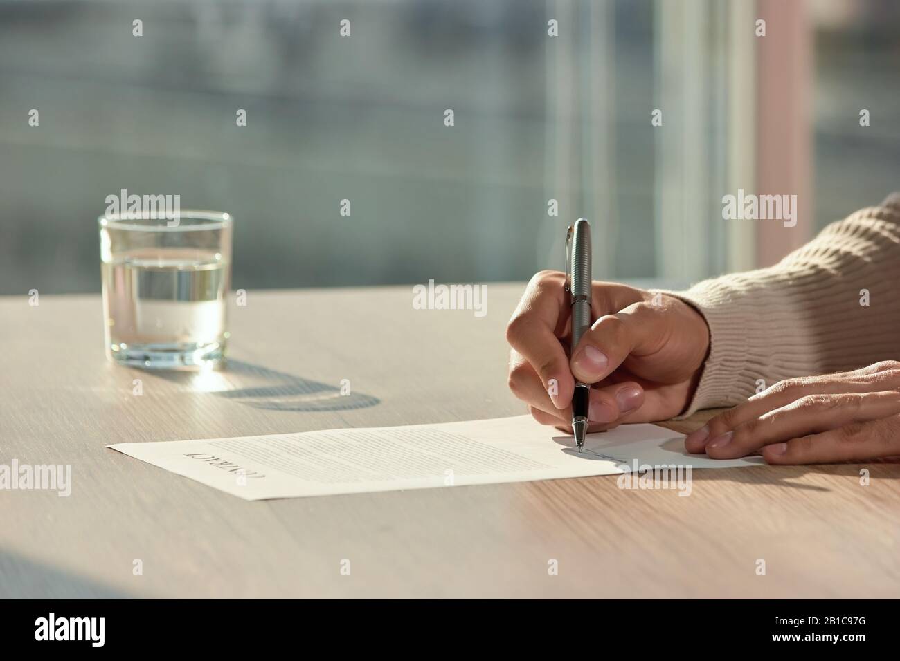 Male man signing pen hi-res stock photography and images - Alamy