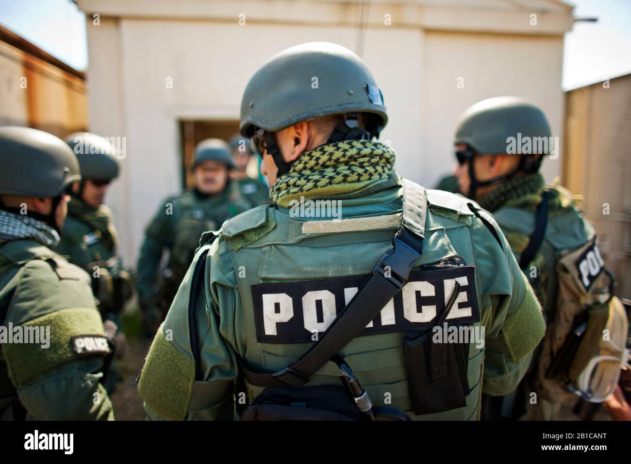 Group of police officers in conversation at a training facility Stock ...