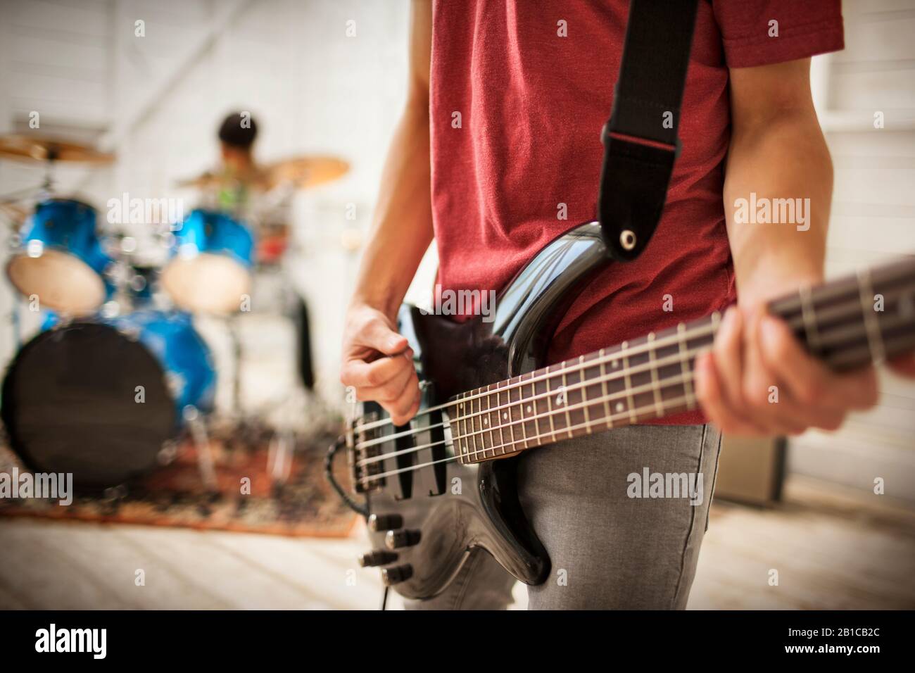 Friends playing musical instruments together Stock Photo - Alamy