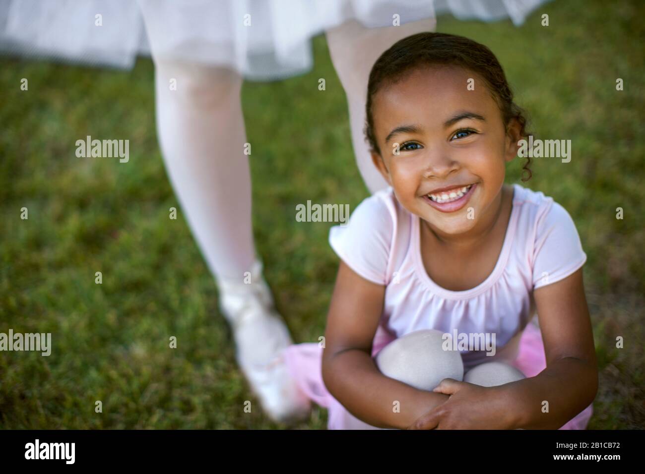 Portrait of a smiling young ballet dancer Stock Photo - Alamy