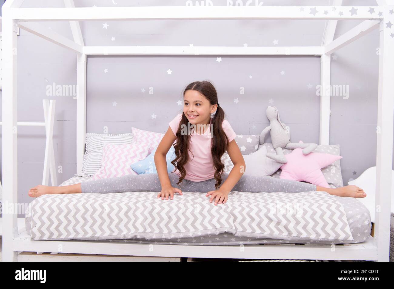 Improve flexibility. Stretching good. Evening stretching. Cute gymnast ...