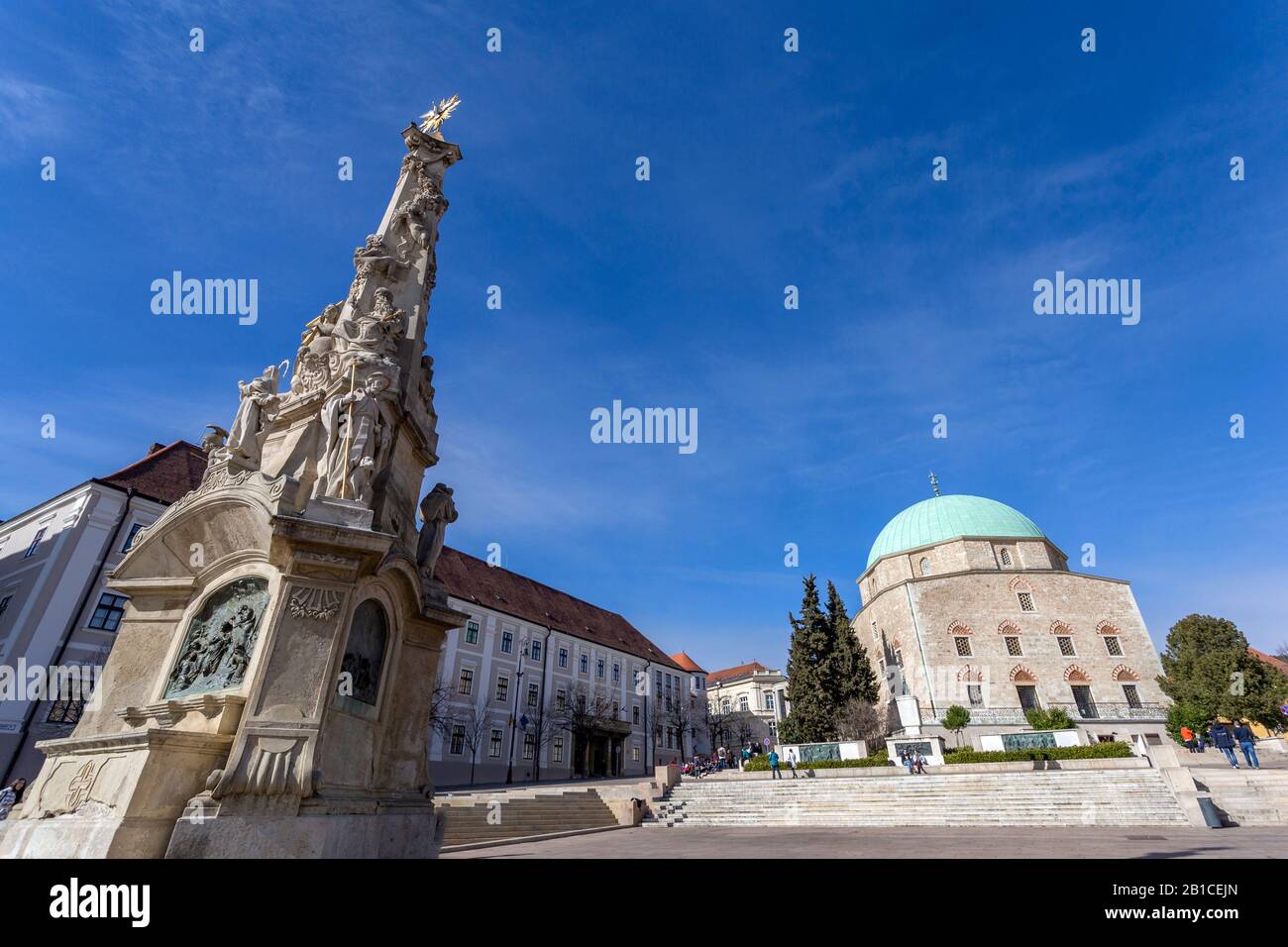 Holy Trinity statue with the mosque of pasha Qasim the Victorious in ...