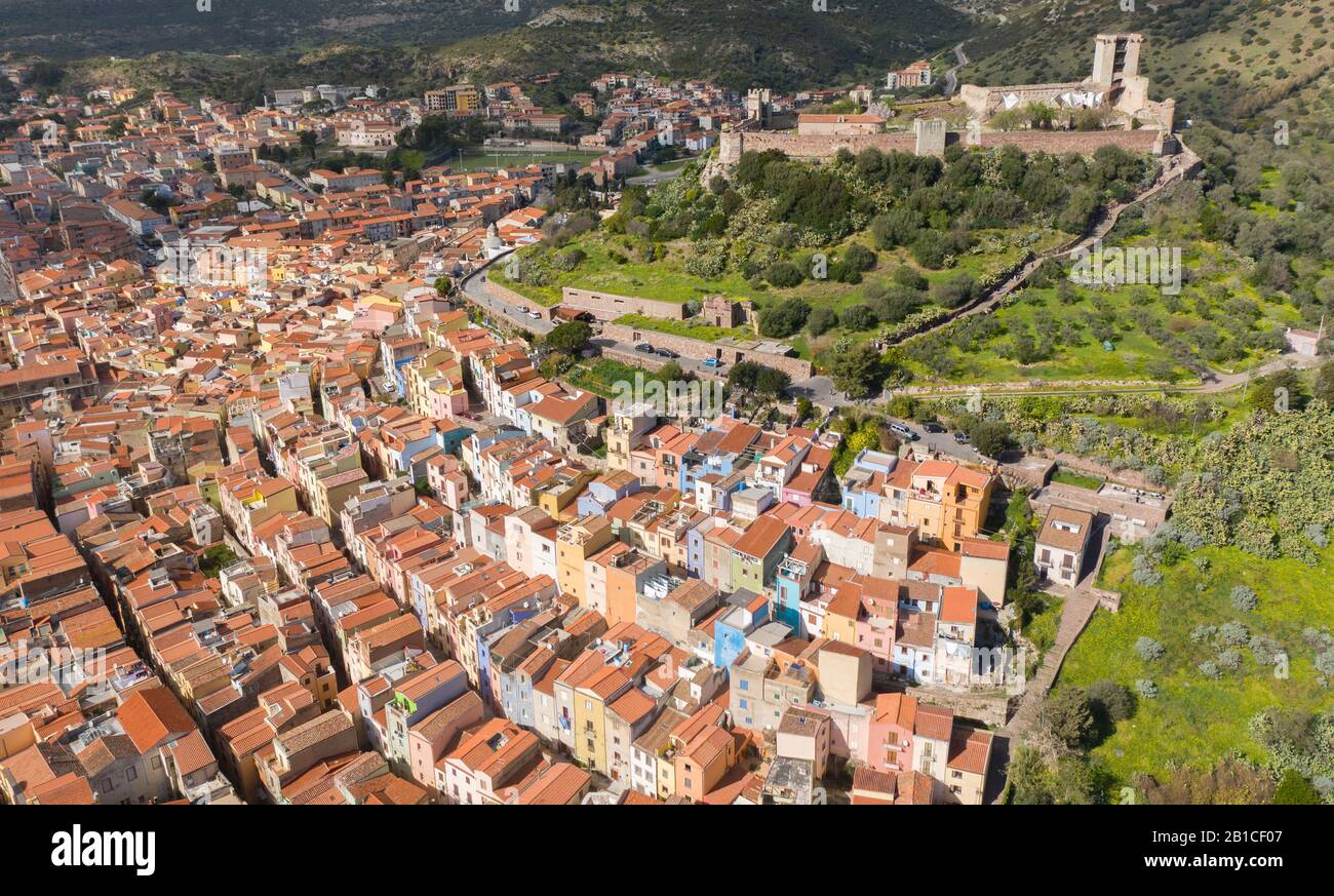 aerial view of bosa town with his colored houses and the castle in ...