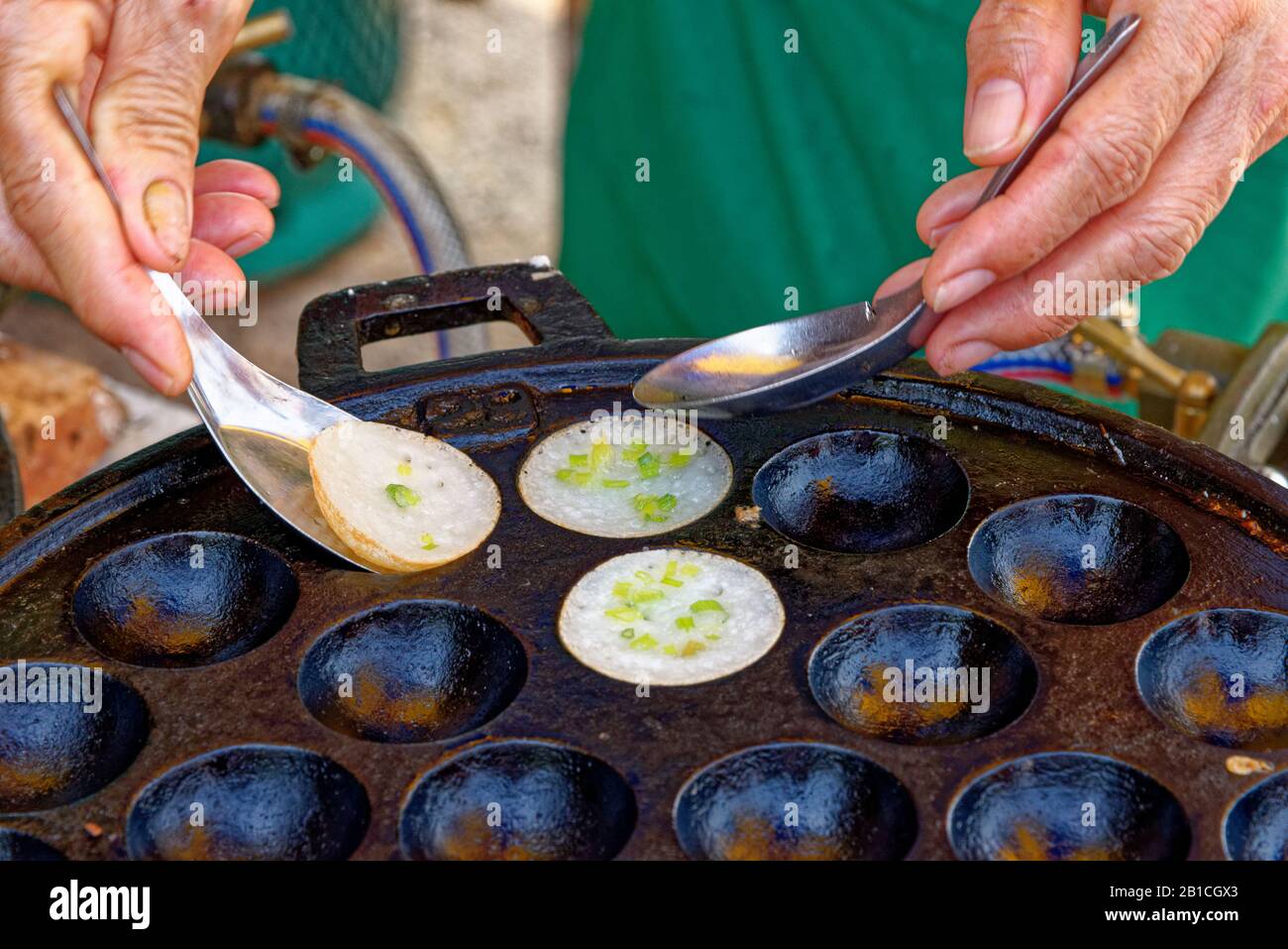 Traditional thai street food dessert, Kanom Krok or coconut rice ...