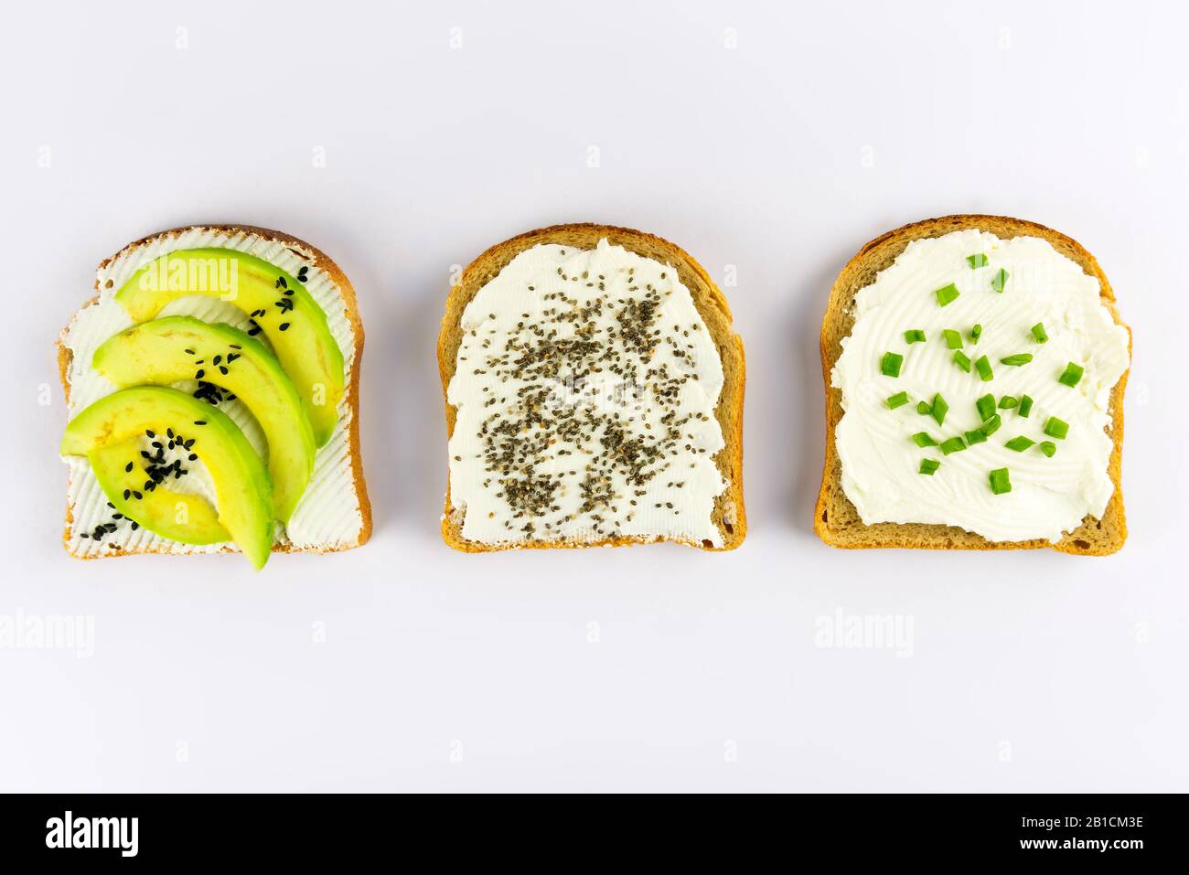 Set with toast bread and different toppings with superfoods, chia seeds ...
