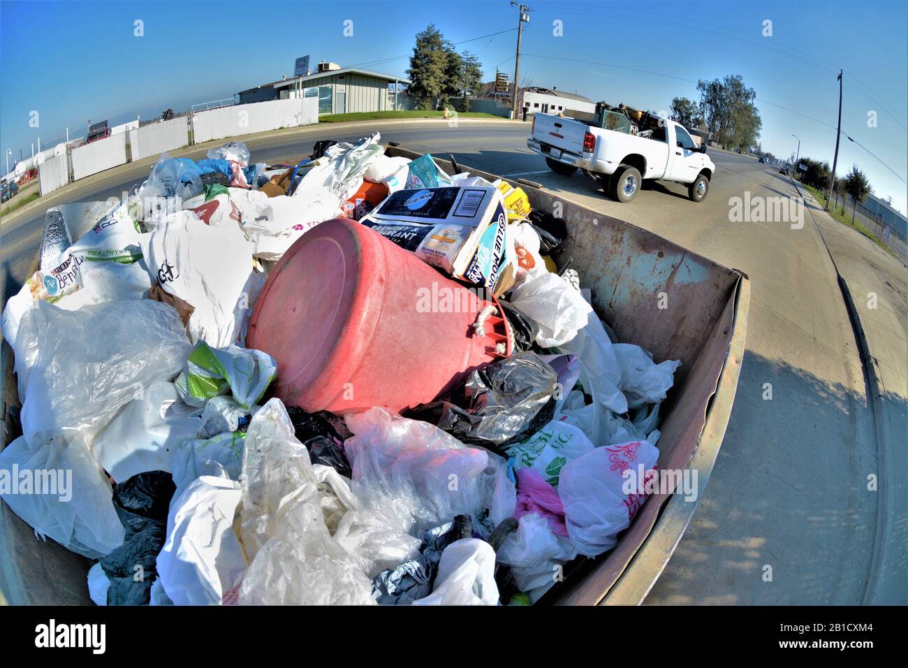 Litter and trash for disposal or recycling from homes and families with ...