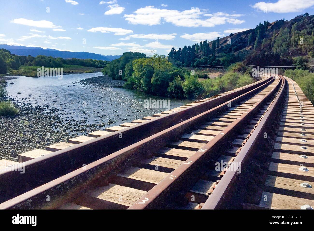 Sweeping lines of the rail track crossing the Ruamahanga river in ...