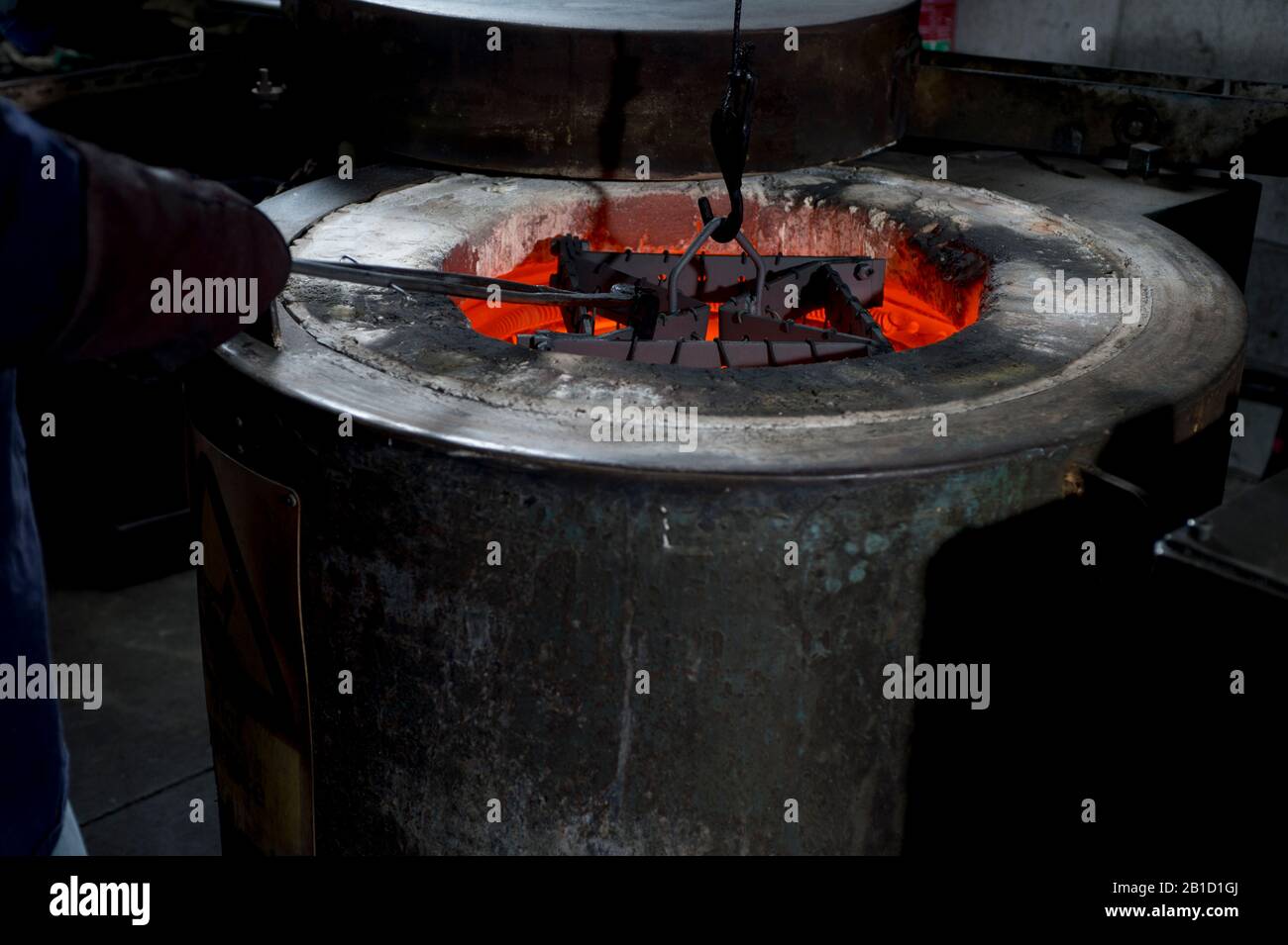 Tempering process in Knife factory. Furnace, Oil bath and draining ...