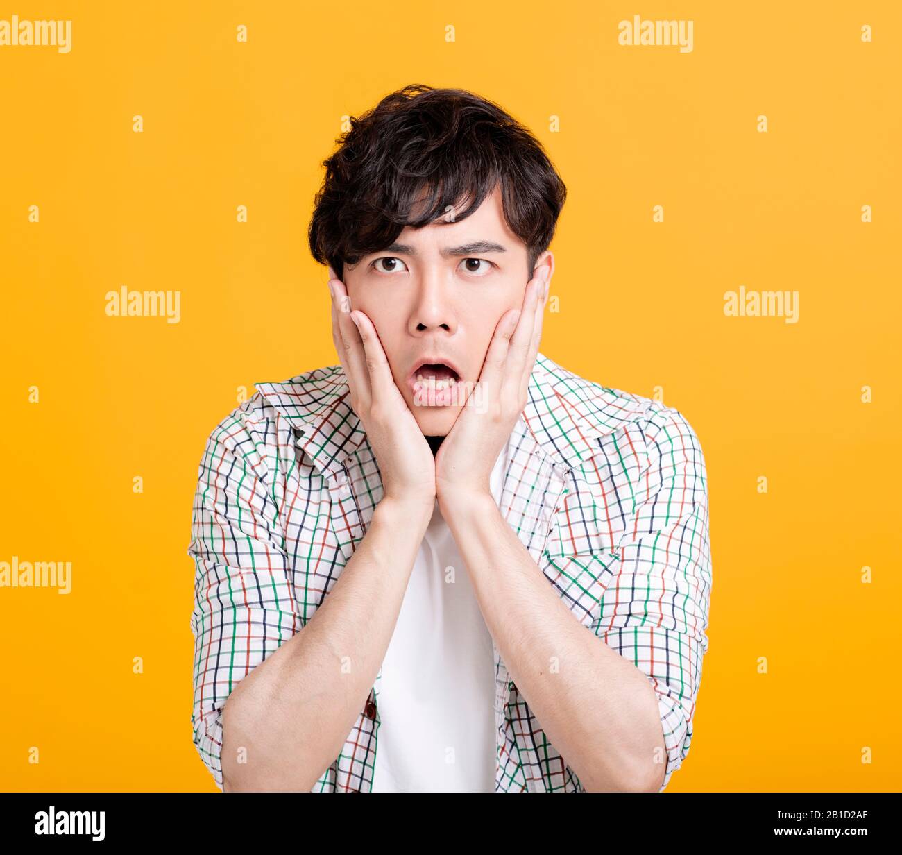 Closeup of shocked and surprised young man Stock Photo - Alamy