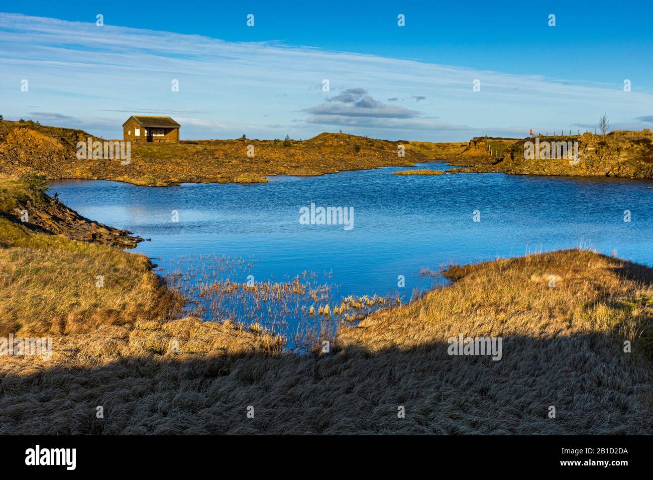 The shelter and lake at Achanarras Quarry Nature Reserve, known for its ...