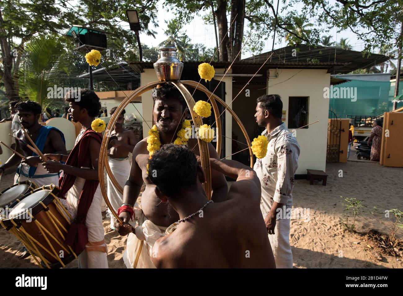 Devotees being pierced with hooks to hang as a ritualistic act of ...