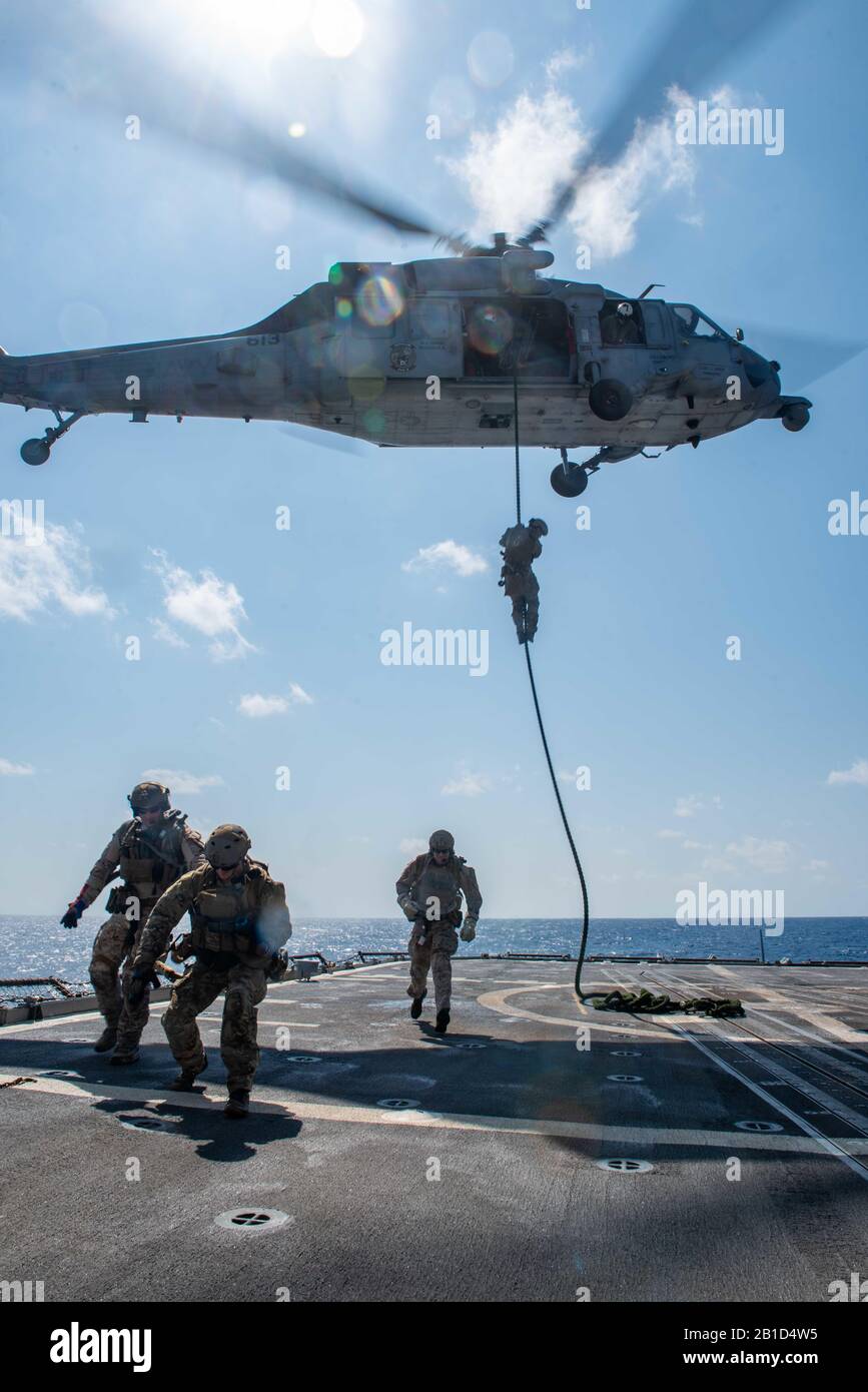 PACIFIC OCEAN (Feb. 20, 2020) U.S. Navy Sailors fast rope from an MH ...