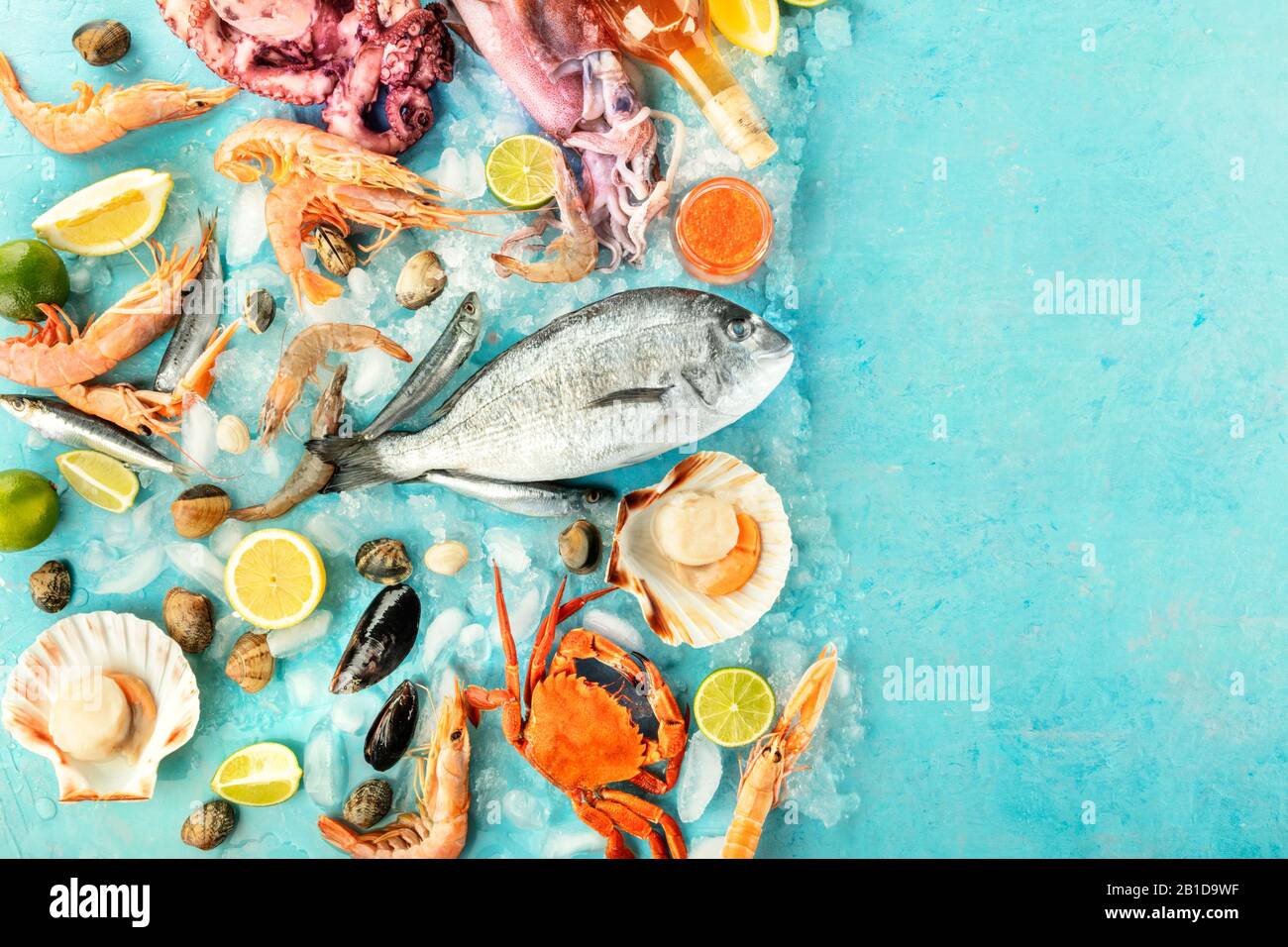 Fish and seafood overhead background with a place for text. Sea bream ...
