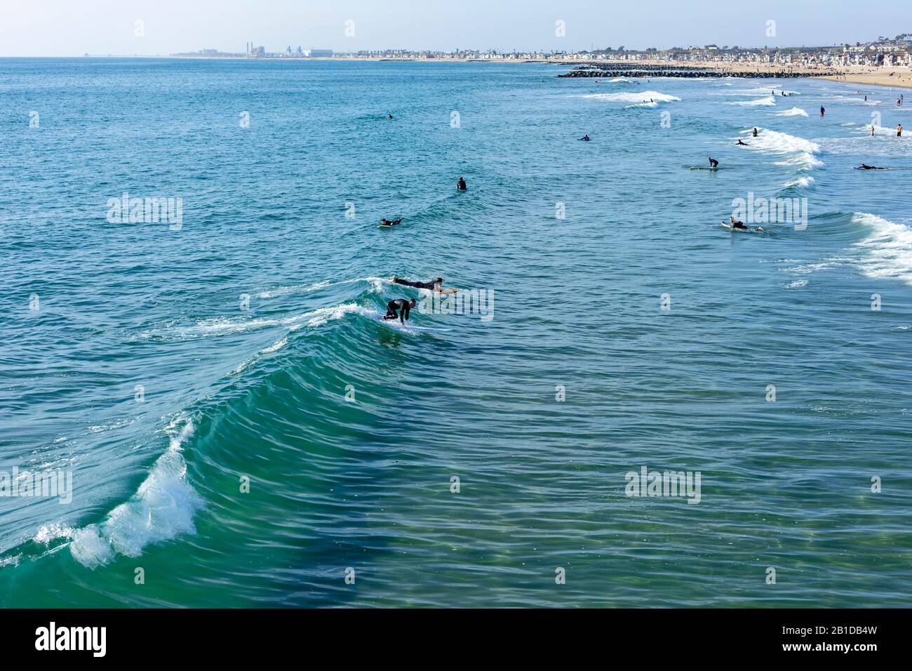 Surfers riding the waves in Newport Beach, California, USA Stock Photo ...