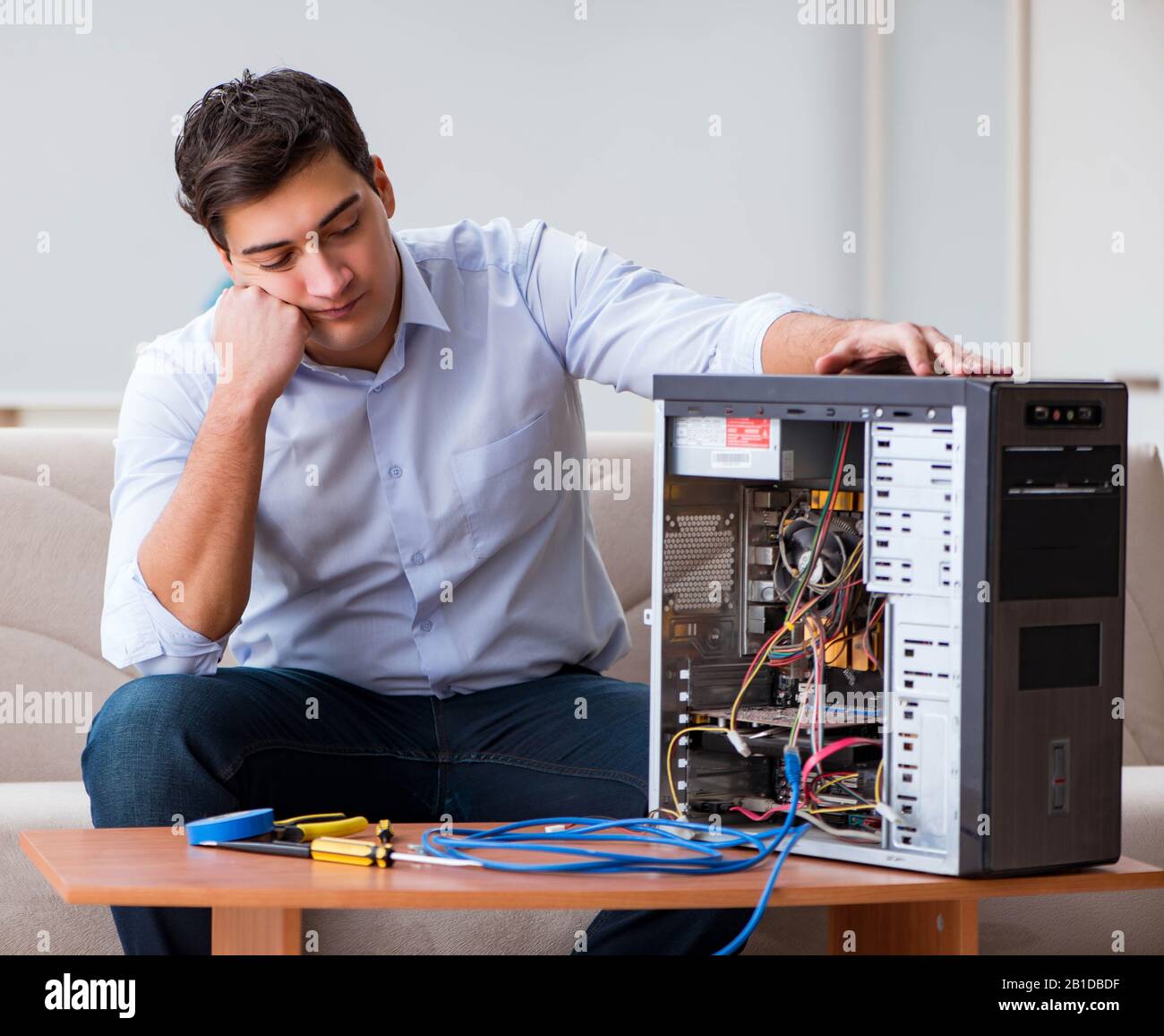 The frustrated man with broken pc computer Stock Photo - Alamy