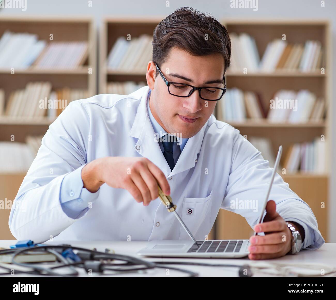 The it technician repairing broken laptop notebook computer Stock Photo ...