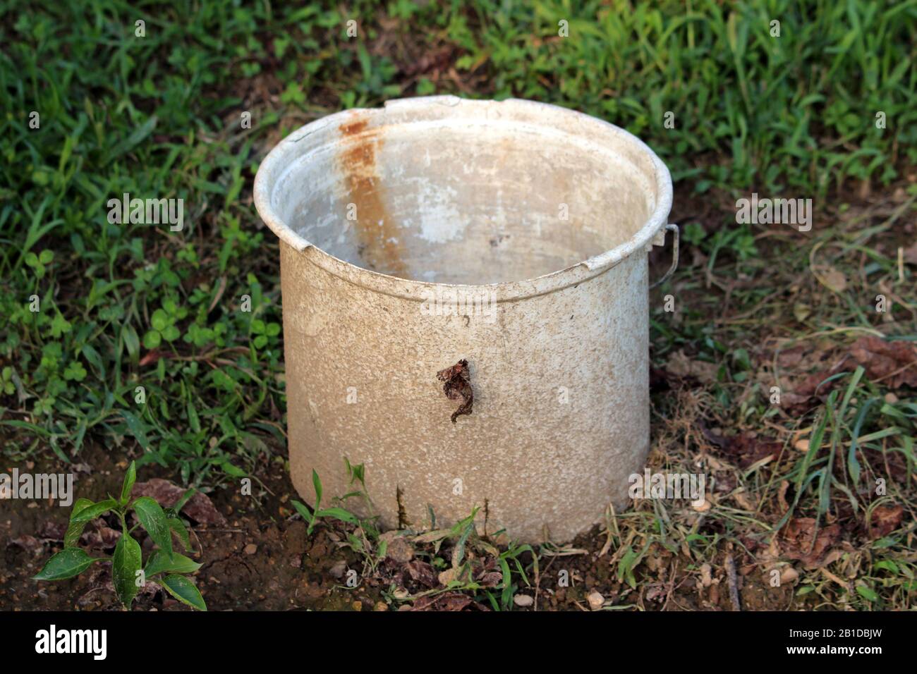 Broken bucket hi-res stock photography and images - Alamy
