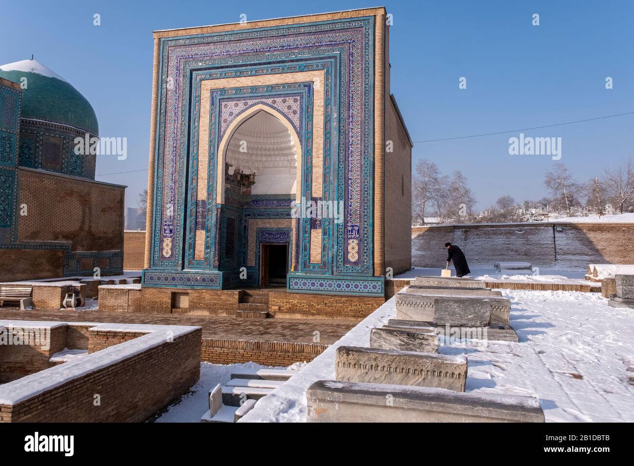 A man clears the snow at the Shahi Zinda Necropolis, Samarkand ...