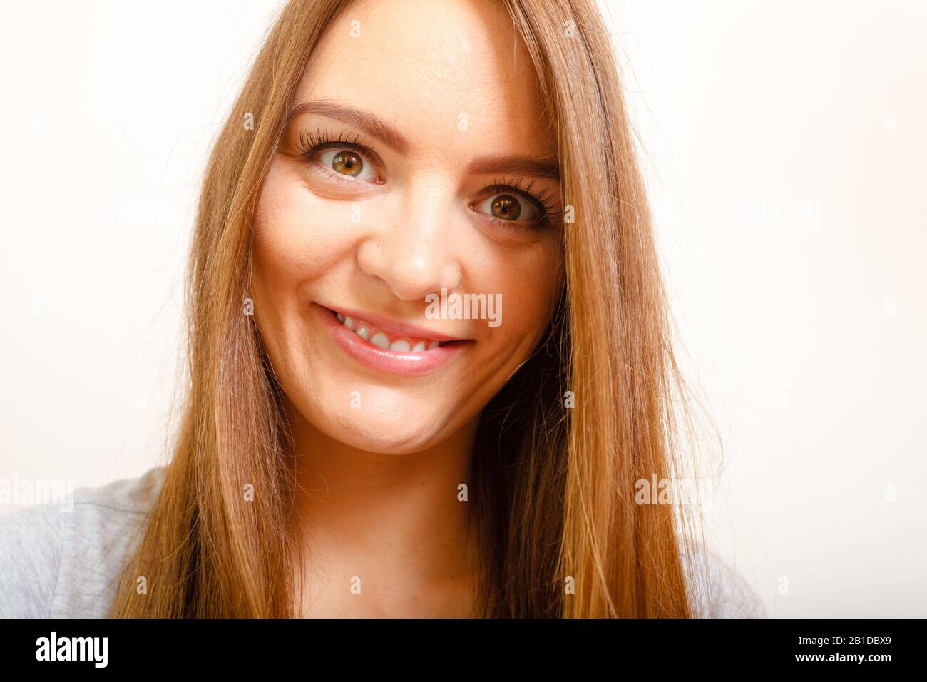 Crazy, happy concept. Happy psycho woman smiling in creepy way, close ...