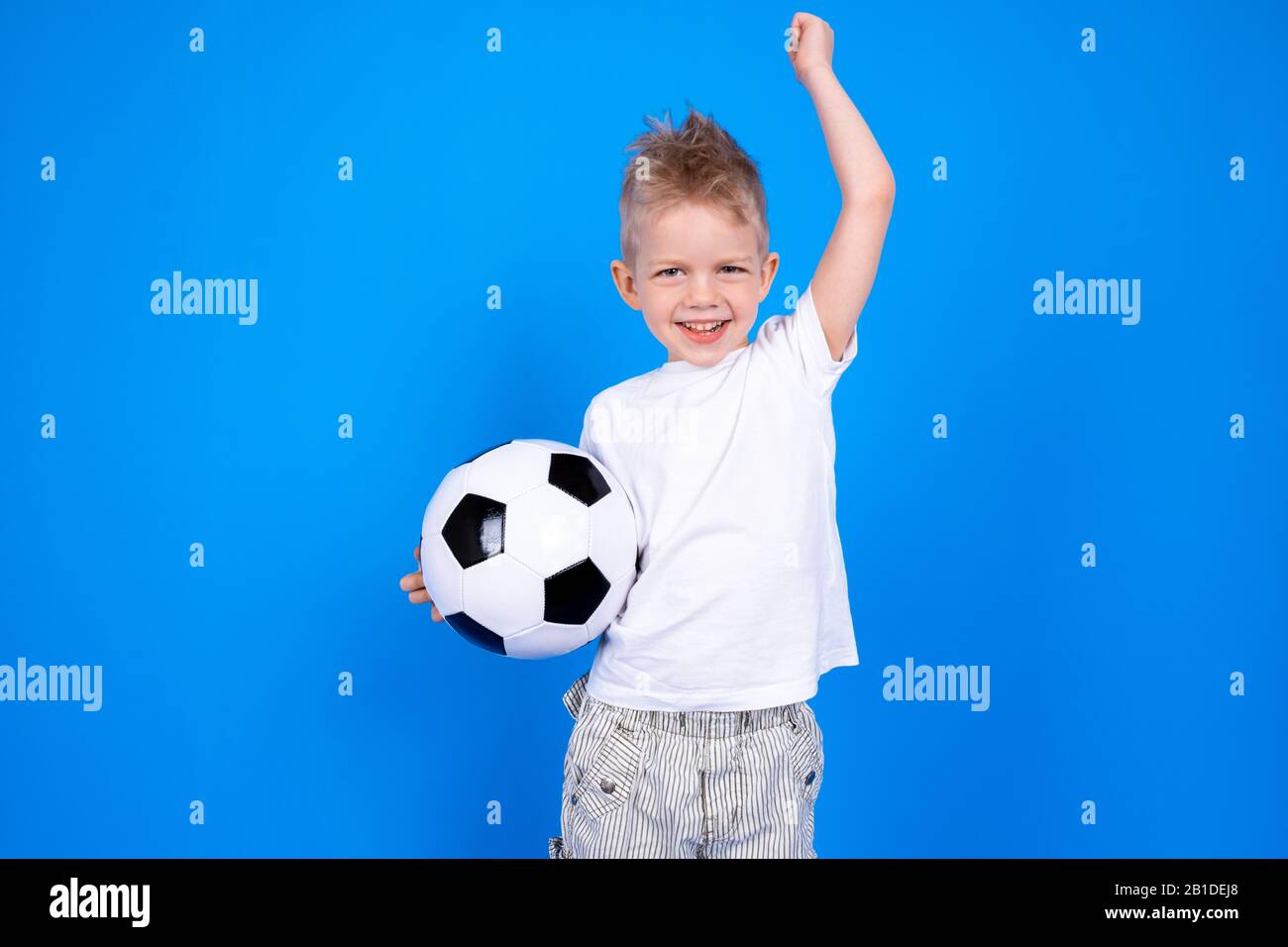 Soccer fans. Cheerful caucasian child boy boy celebrating victory ...