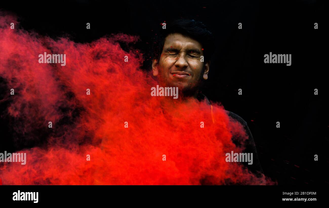 Young man with holi colors. holi is a festival of India. It is festival ...