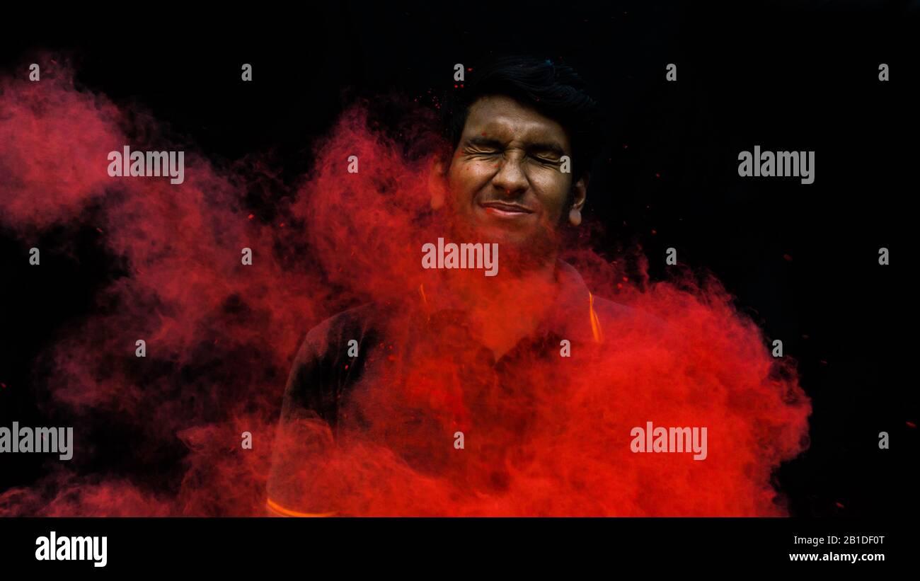 Young man with holi colors. holi is a festival of India. It is festival ...