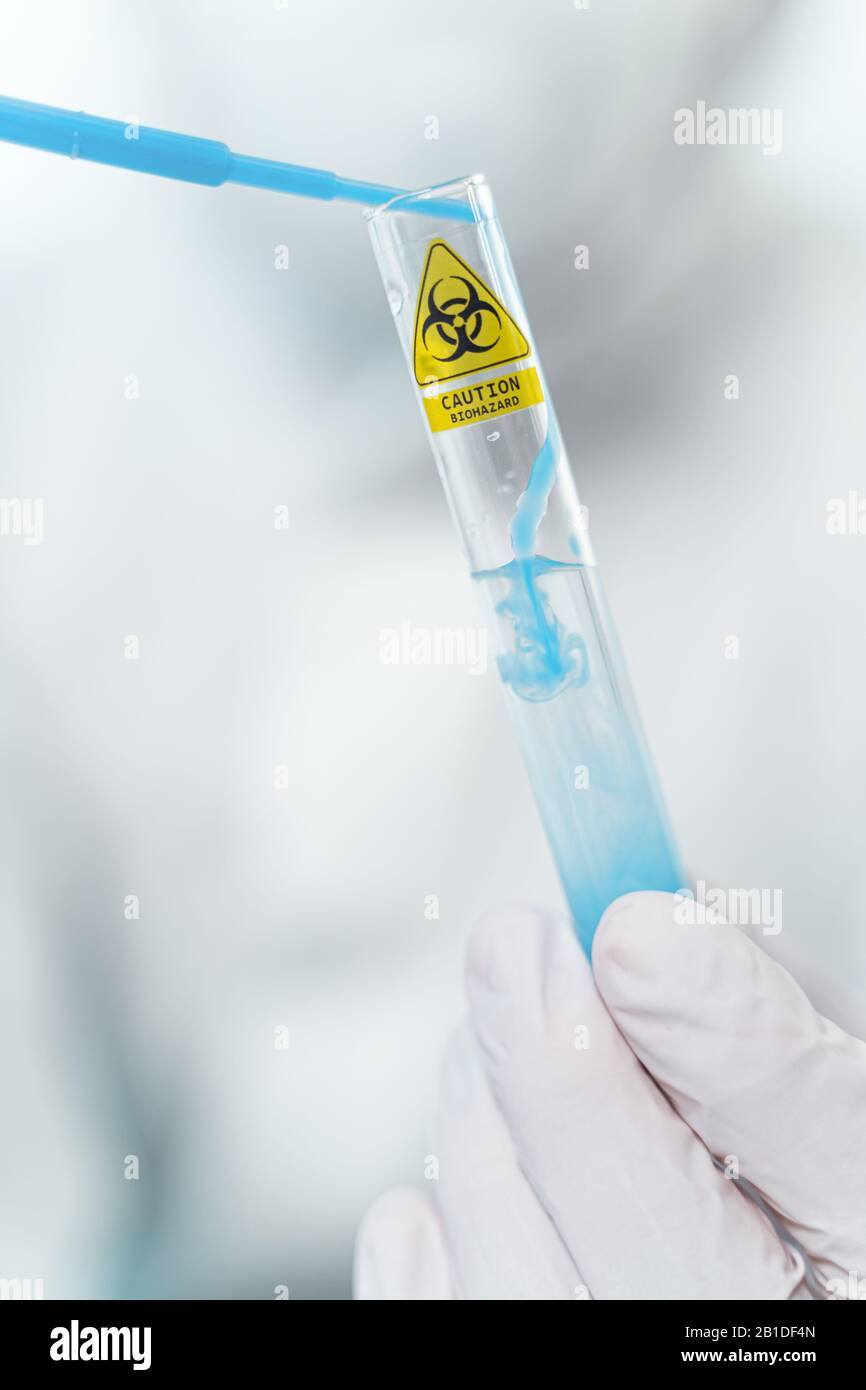 Focused photo on marked test tube with liquid Stock Photo - Alamy