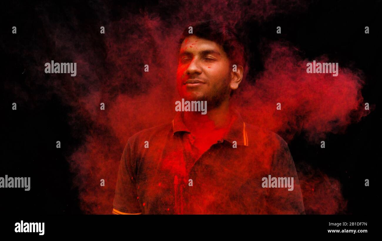 Young man with holi colors. holi is a festival of India. It is festival ...