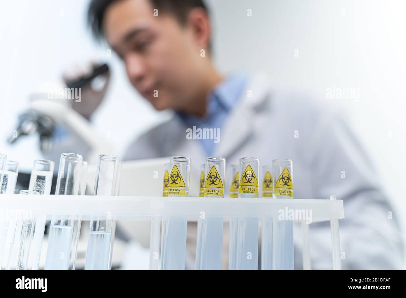 Close up of test tubes that standing on support Stock Photo - Alamy