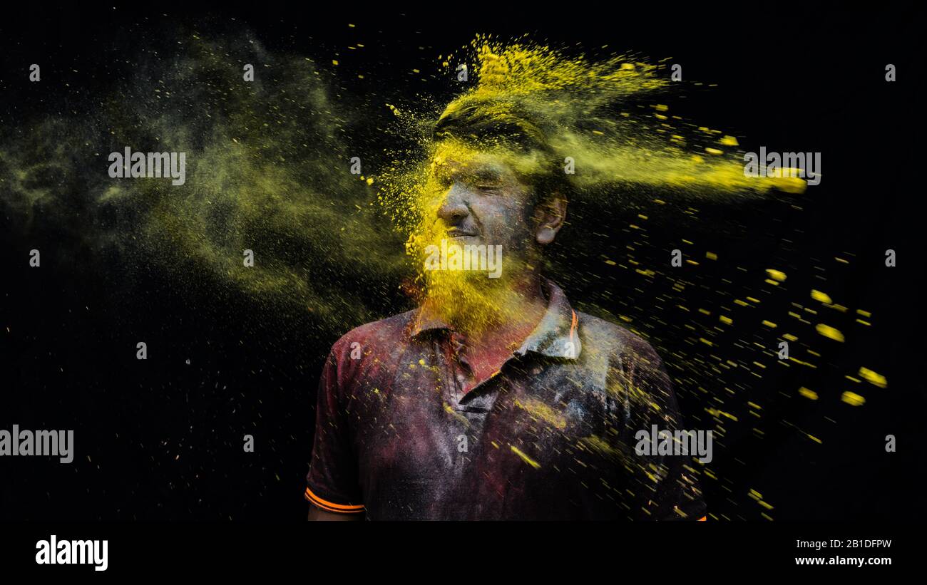 Young man with holi colors. holi is a festival of India. It is festival ...