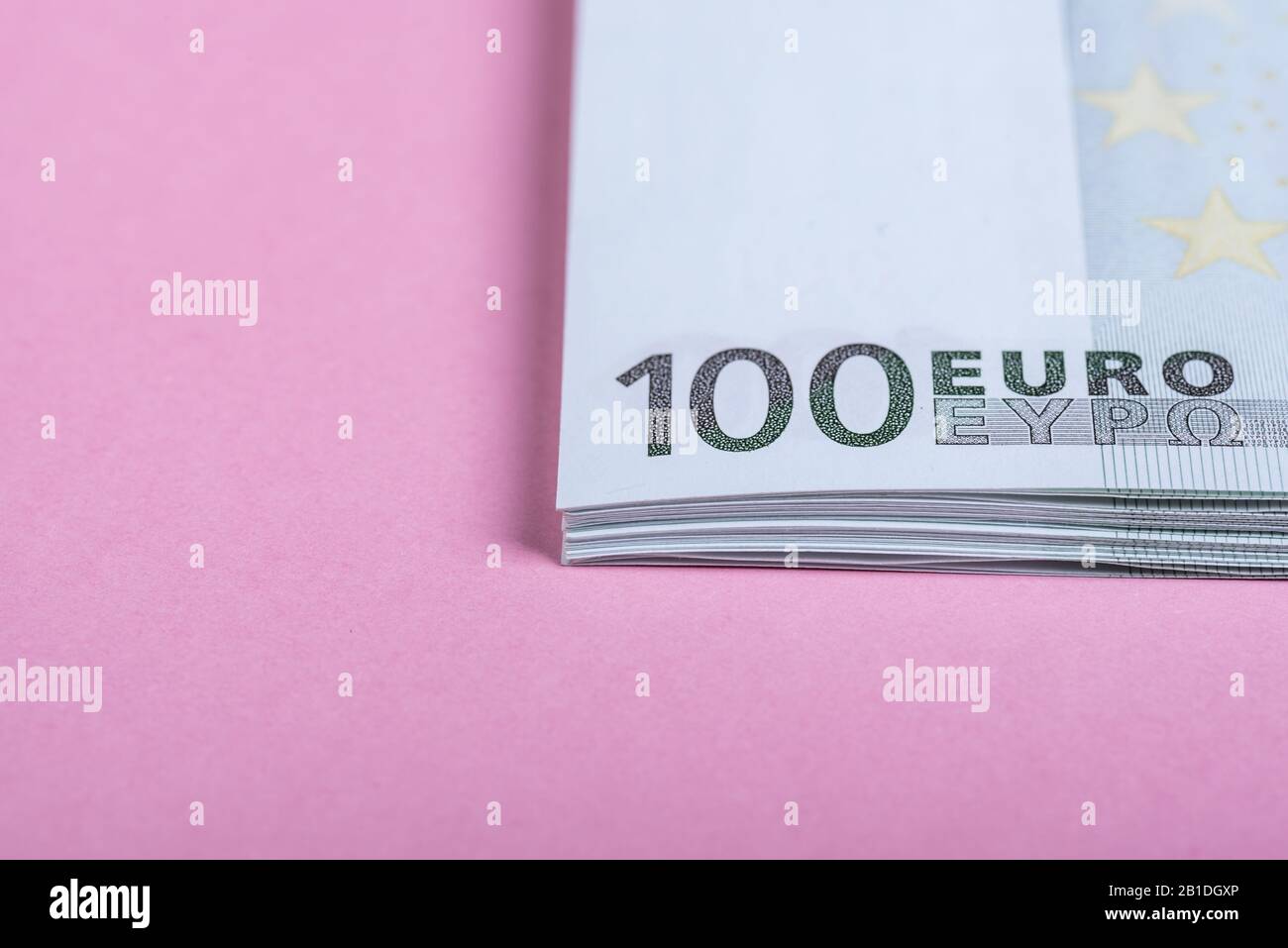 Euro cash on a lilac, purple and pink background. Euro Money Banknotes ...