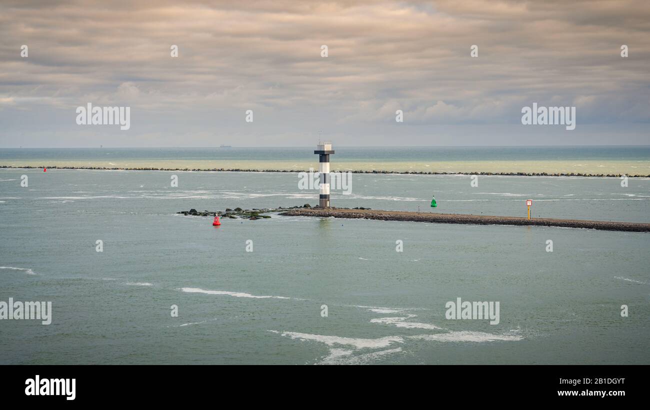 North Sea with a harbour light near the Port of Rotterdam, South ...