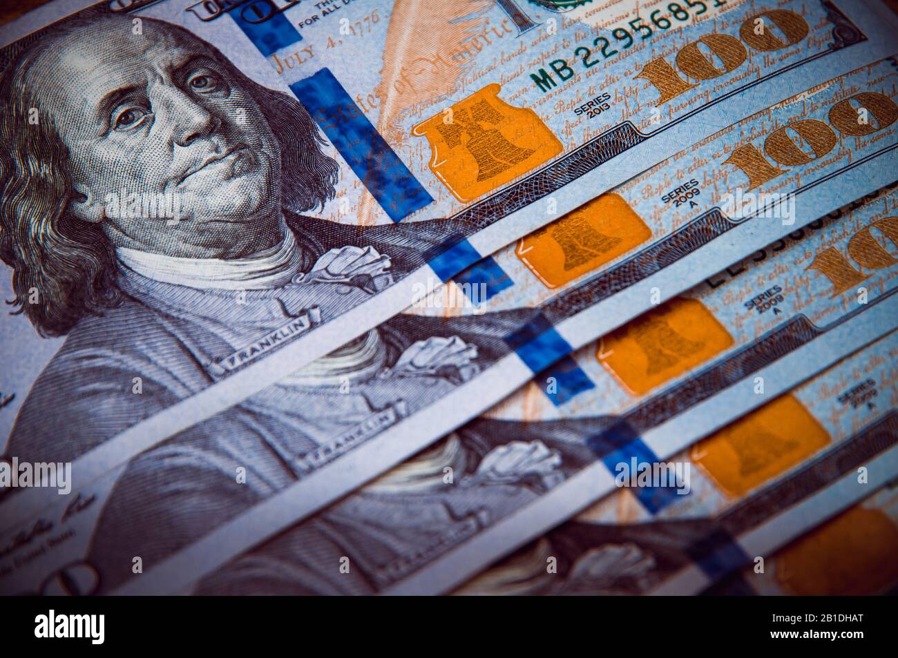 The background of a one hundred dollar bill. Style blue light Stock ...