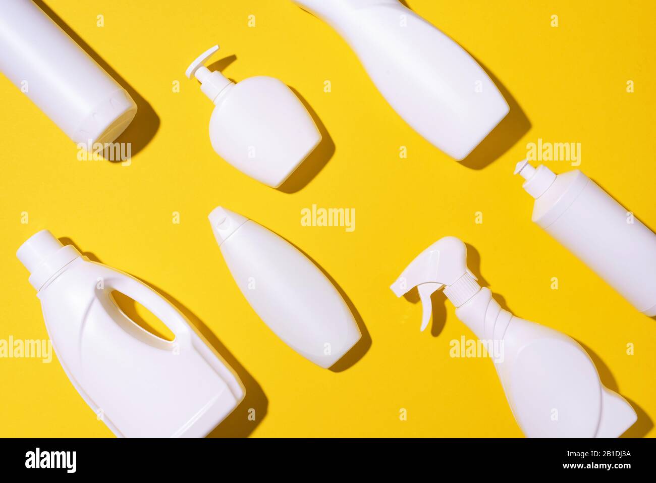 Plastic garbage collection on yellow background. Top view. Copy space ...