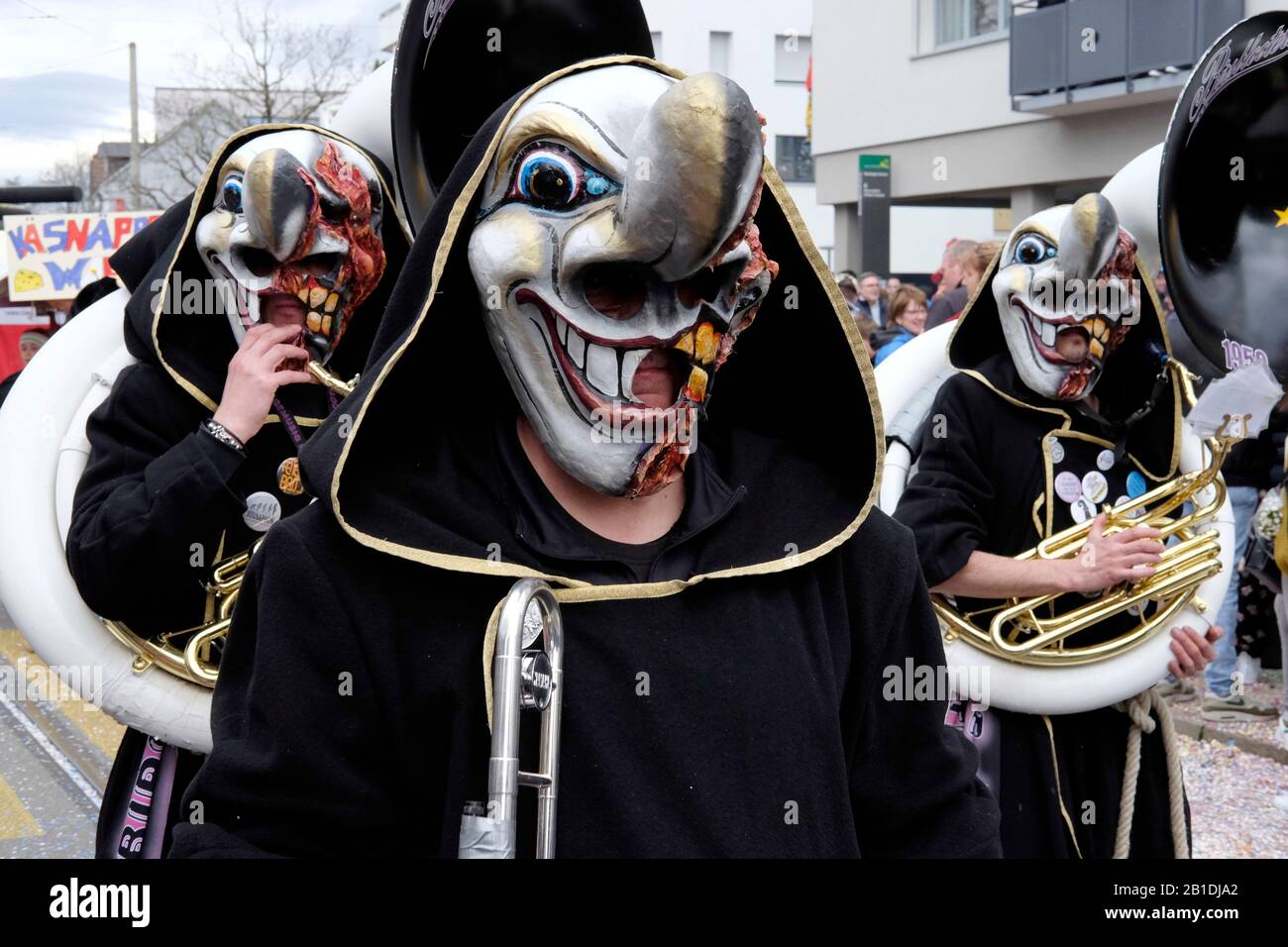 Participants wearing a mask at the carnival in Allschwil, Basel ...