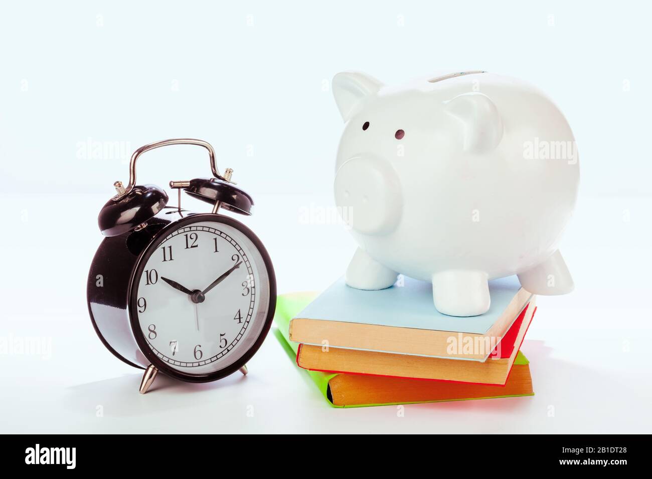 Clock piggy bank sign hi-res stock photography and images - Alamy